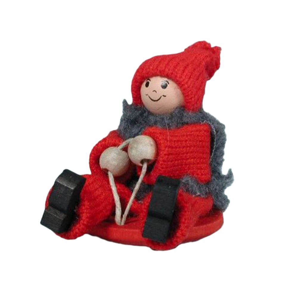 Boy Tomte on Saucer Sled