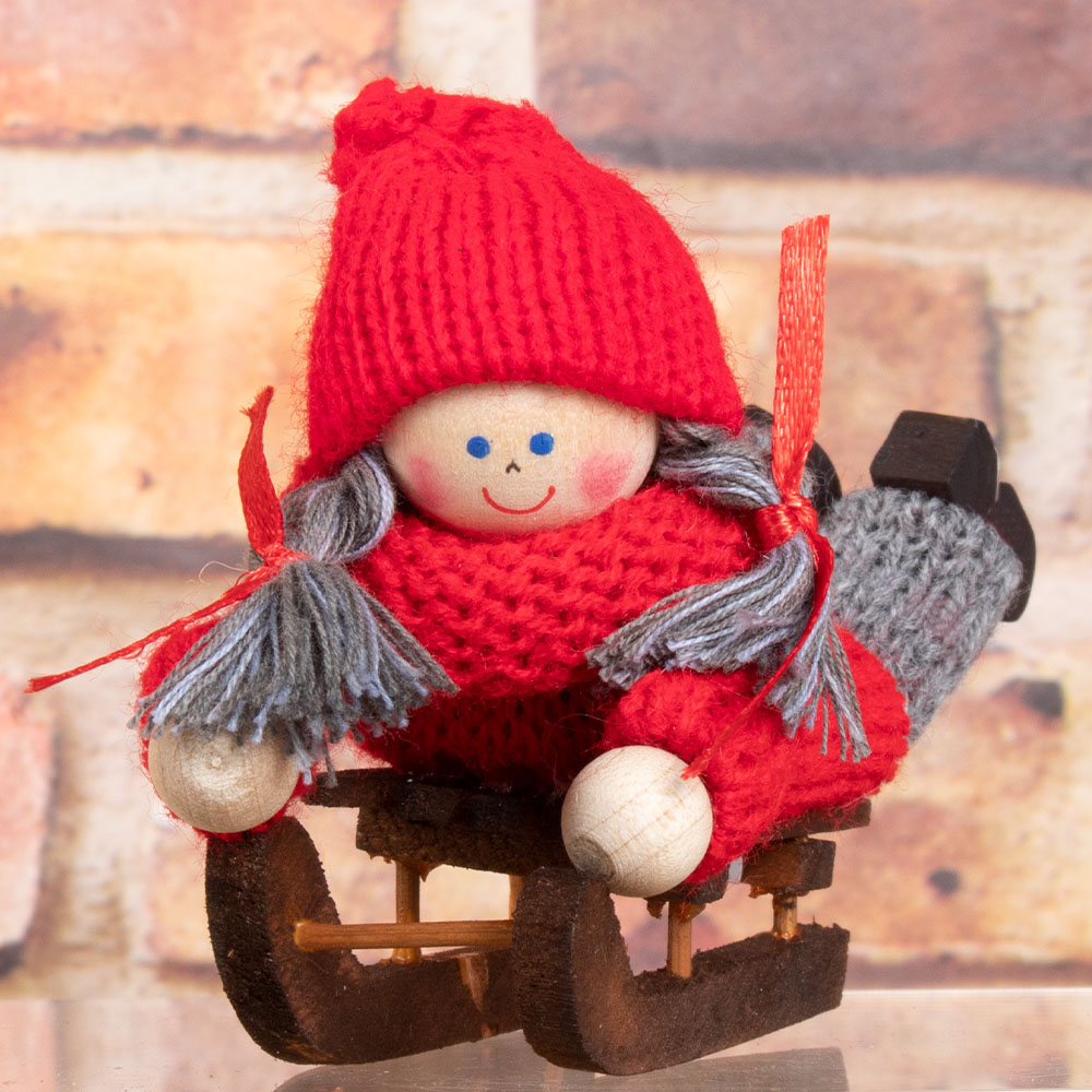 Tomte Girl on a Sled